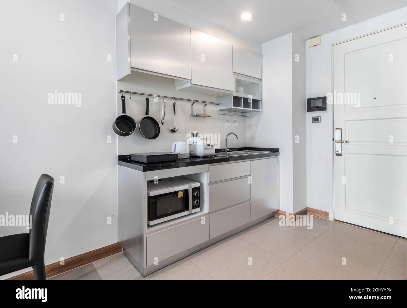 Modern white Kitchen Counter and Kitchen Equipment in Luxurious ...