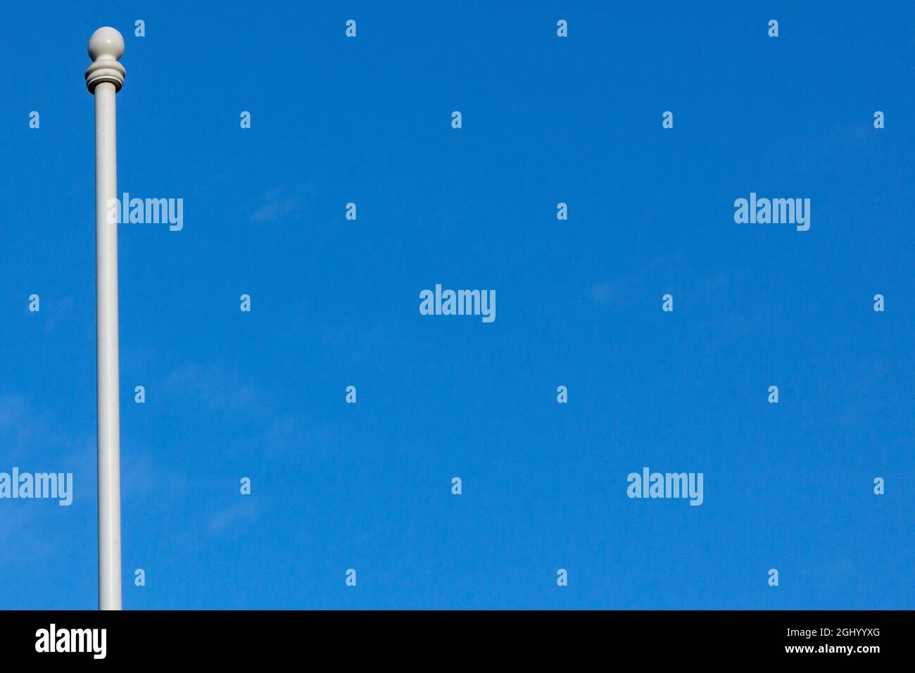 Empty flagpole ready to add a flag to Stock Photo - Alamy