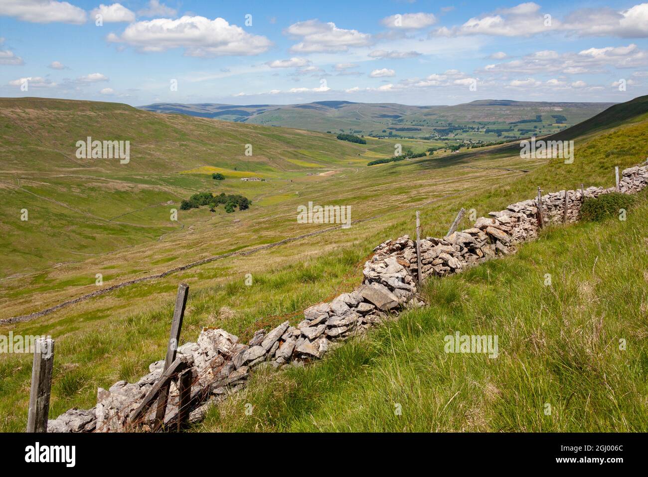 Traditional dry-stone wall and moorland view in the Yorkshire Dales in ...