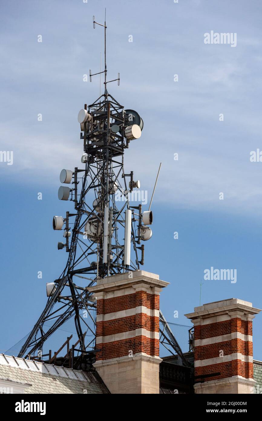 Telecommunications Tower on the roof of a building. Telecommunication ...