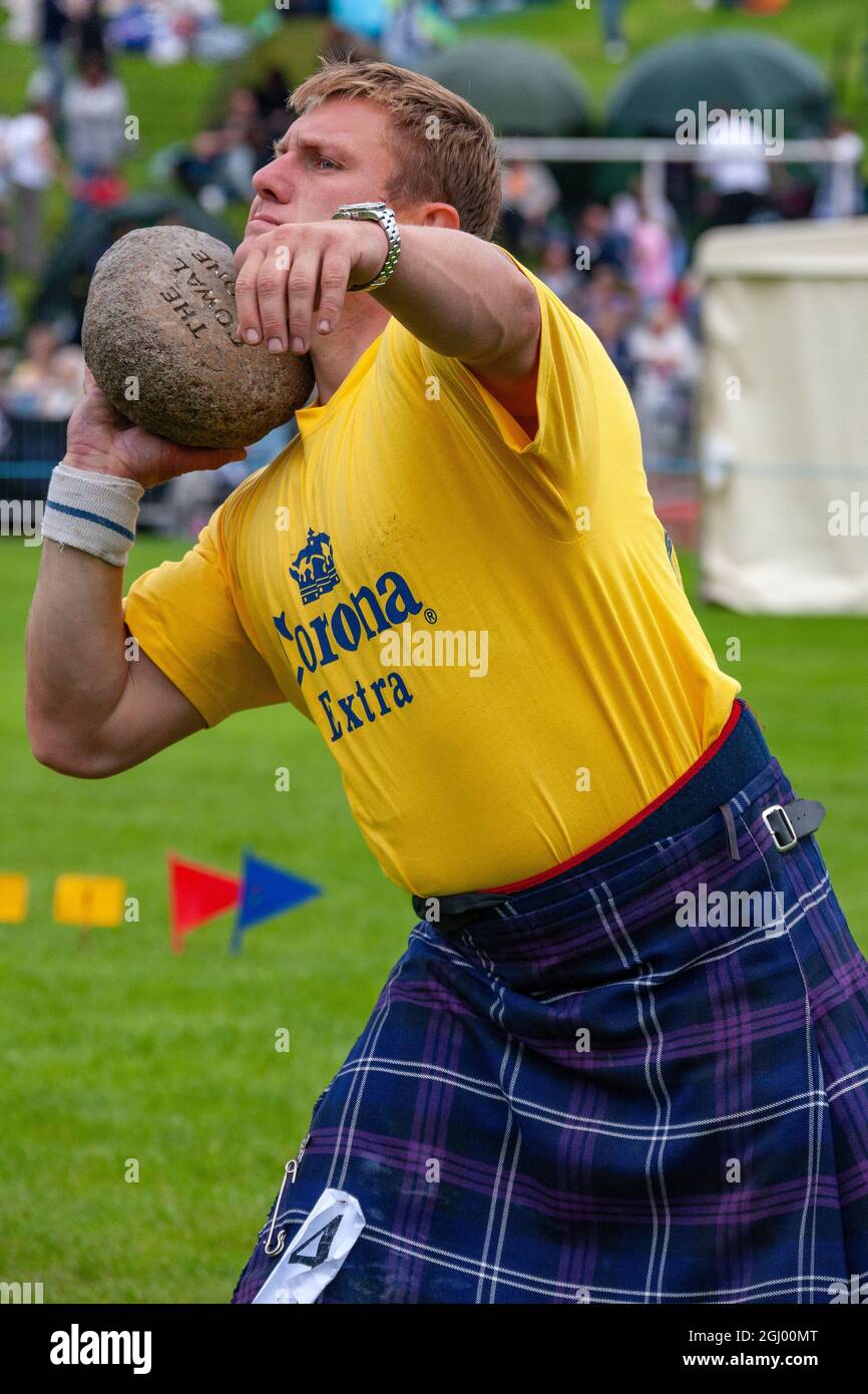Tossing the ‘Cowel Stone’ at the Cowal Gathering. A traditional ...