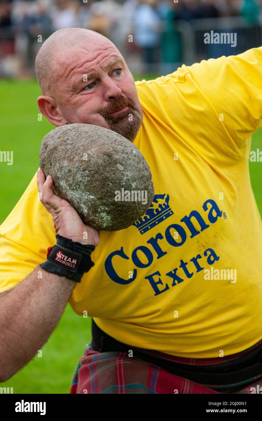 Tossing the ‘Cowel Stone’ at the Cowal Gathering. A traditional ...
