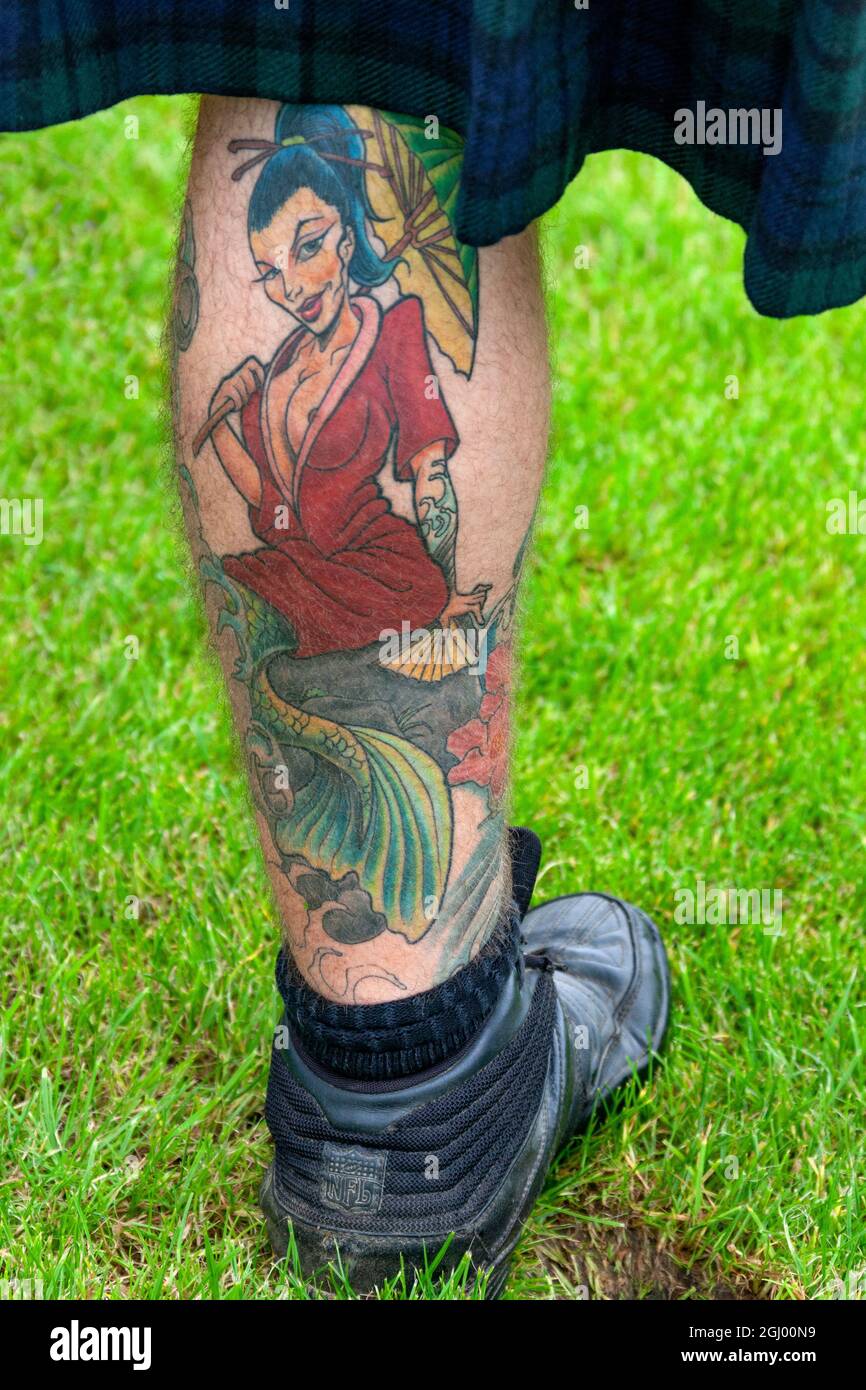 Pin Up Girl Tattoo On Leg