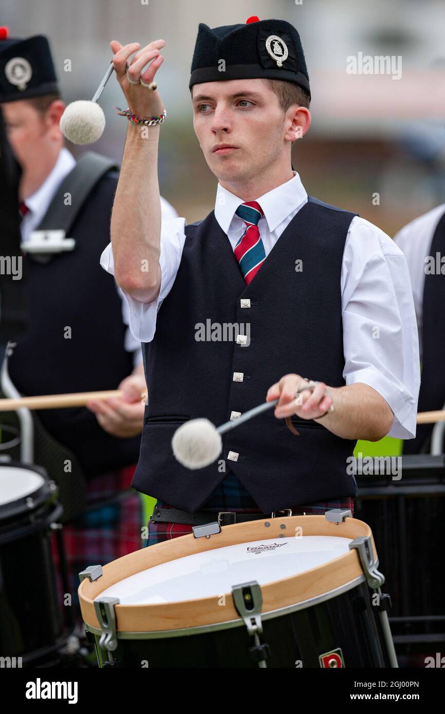 Drummer in a pipe band at the Cowal Gathering Highland Games near ...