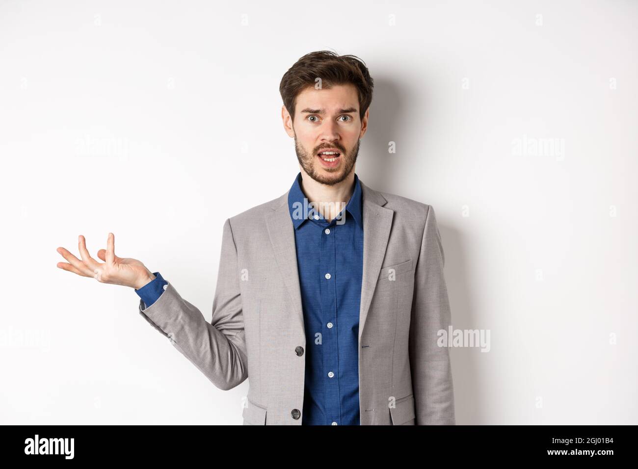 Whats wrong. Confused guy in suit cant understand, looking clueless ...