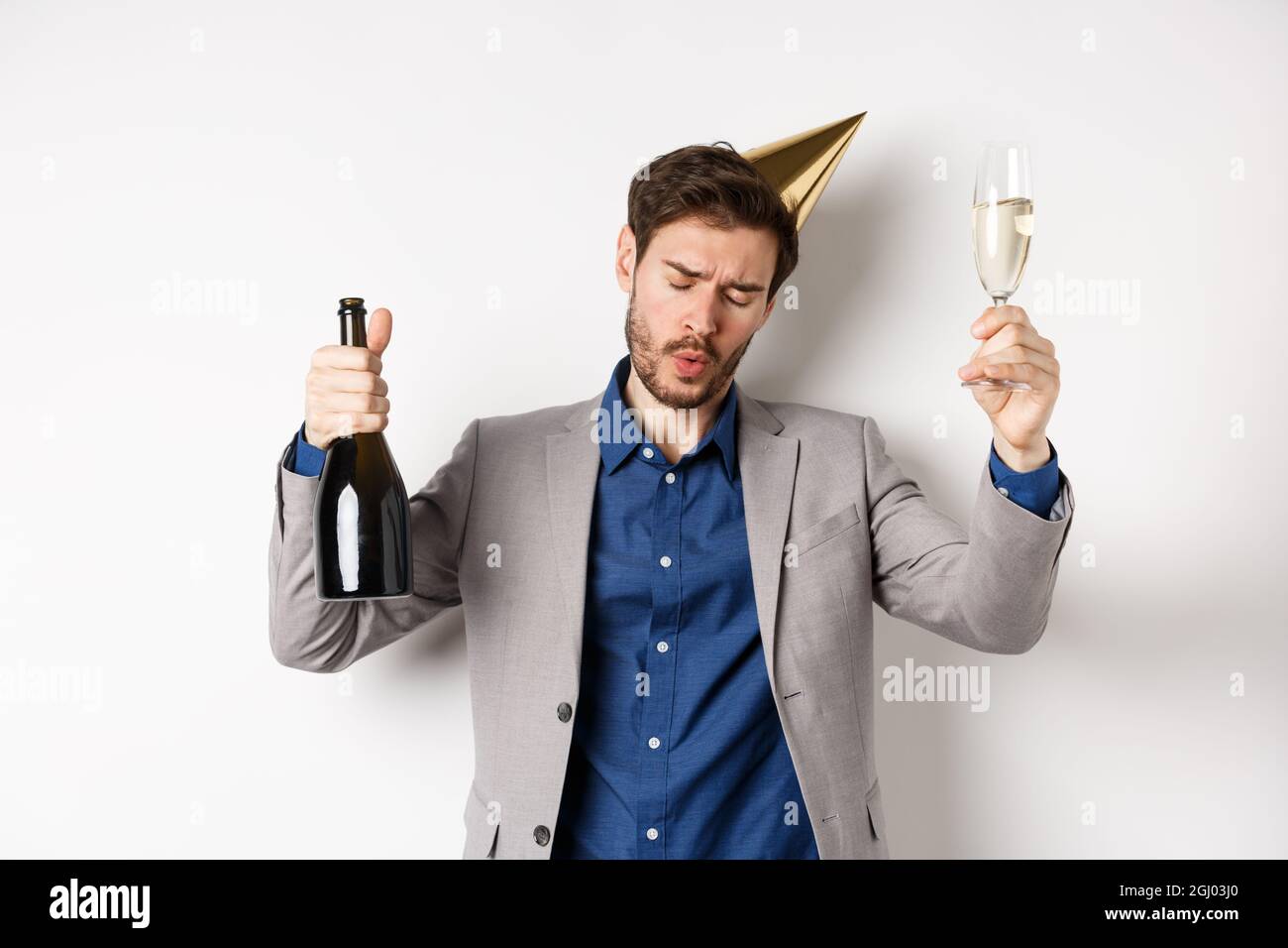 Celebration and holidays concept. Drunk guy dancing at party in ...