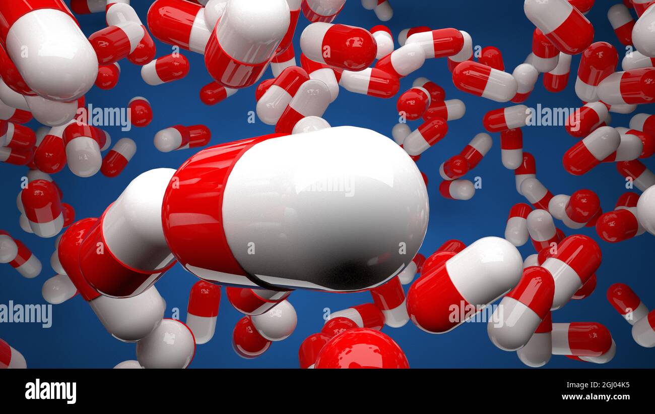 Many red and white medicine pills floating in the air on blue ...
