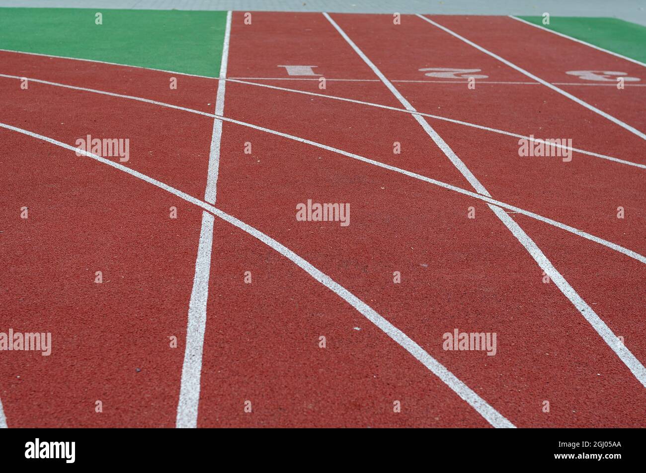 Running tracks with artificial turf. Red tracks in the stadium w Stock ...