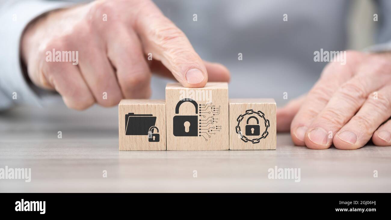 Wooden blocks with symbol of cybersecurity concept Stock Photo - Alamy