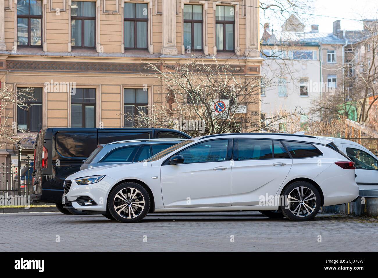 Riga, Latvia - 7 April, 2021: side view of car parked in paved parking ...