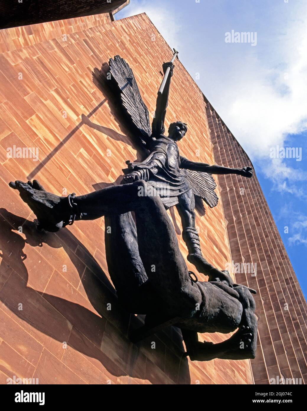 Michael and the Devil sculpture on the Cathedral wall, Coventry, West ...