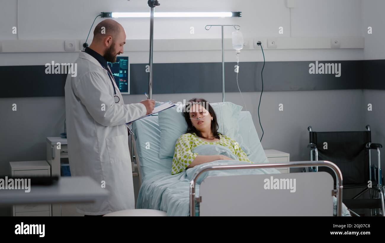 Doctor black skin monitoring hi-res stock photography and images - Alamy