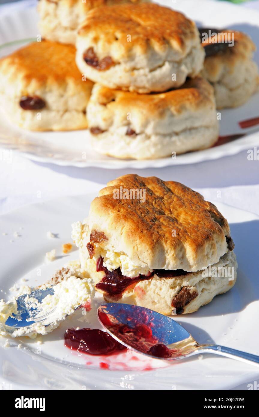 Scones with strawberry jam and clotted cream Stock Photo - Alamy
