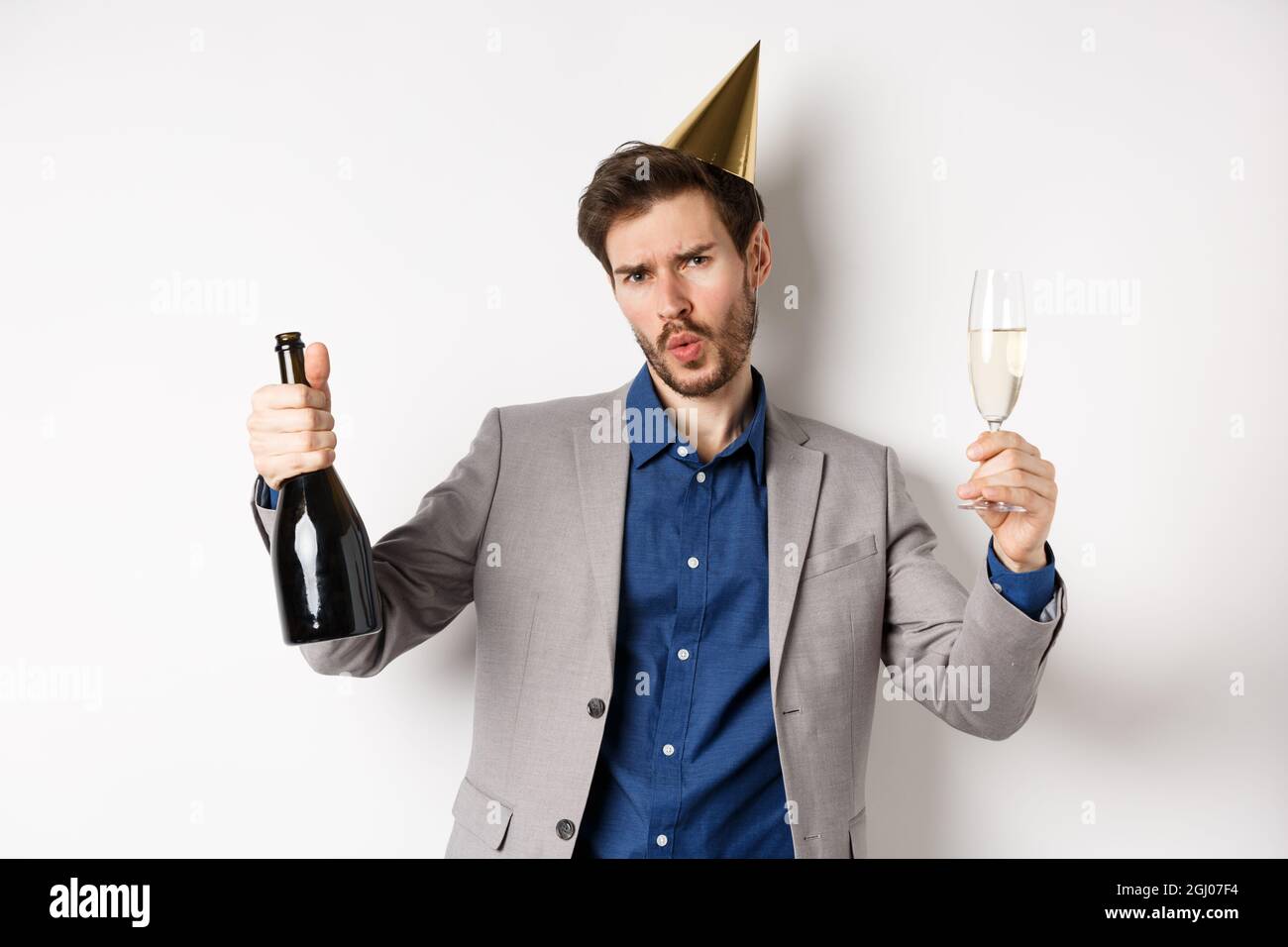 Celebration and holidays concept. Happy man in suit having fun at party ...