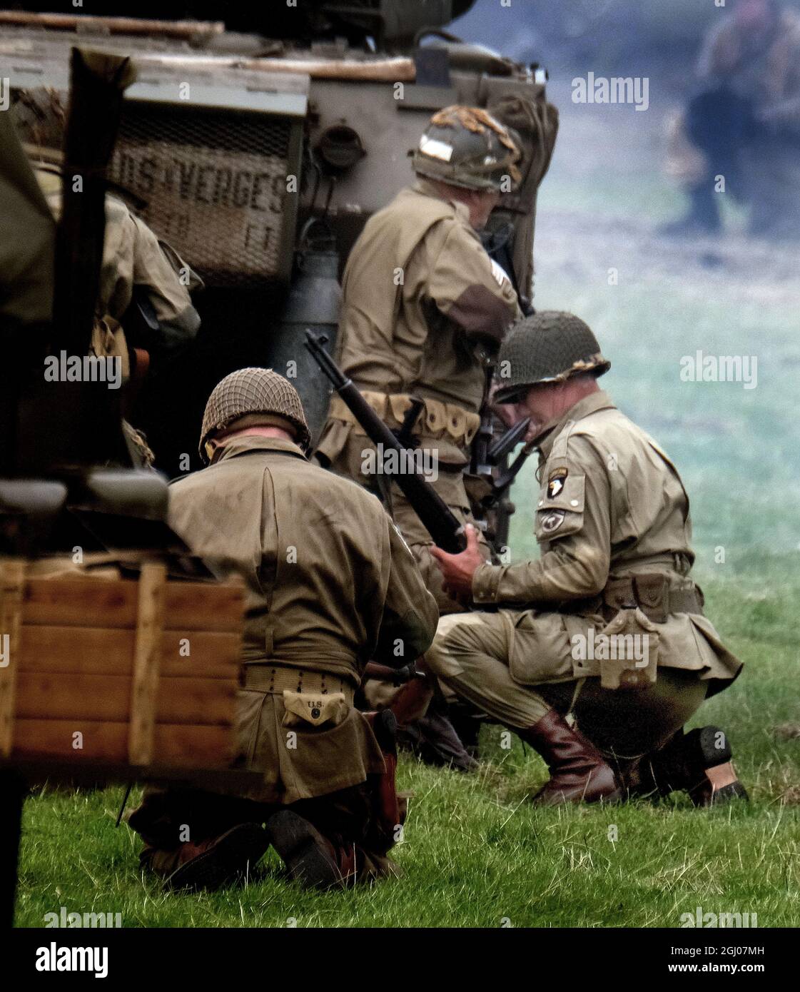 Enactors dressed in second world war American army uniform in mock ...