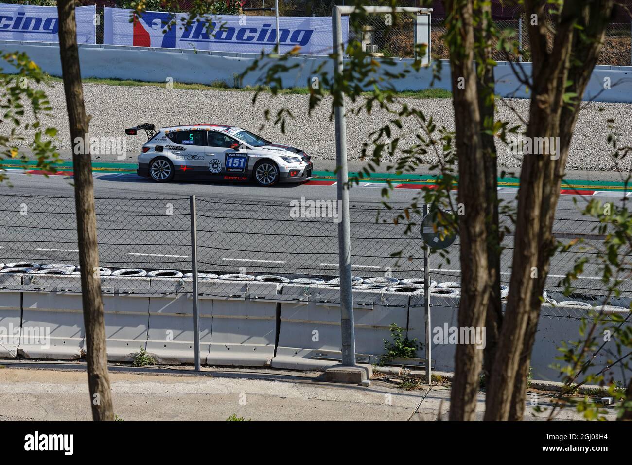 BARCELONA, SPAIN, September 5, 2021 : On track behind the trees during ...