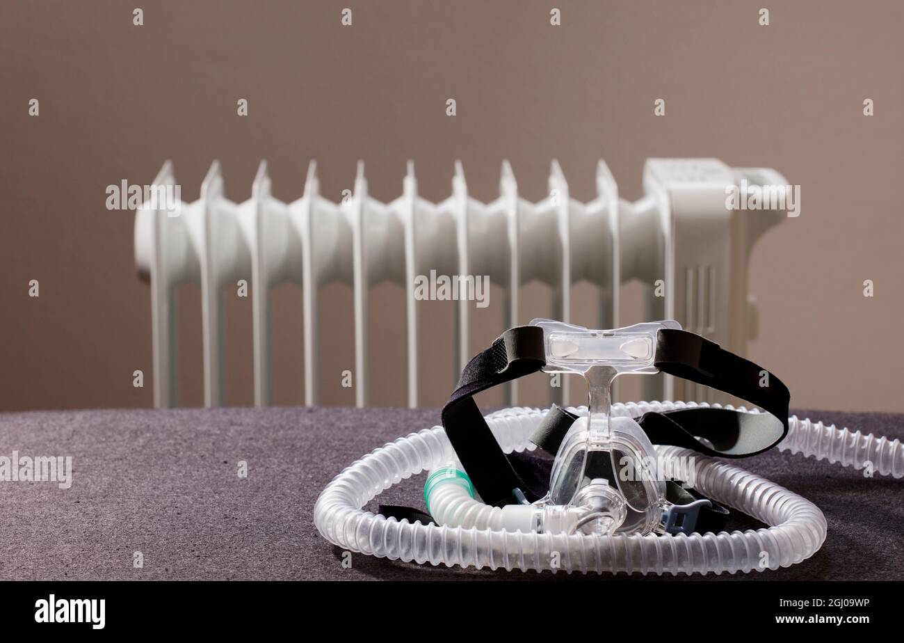 Assisted breathing mask, with heating radiator in elderly residence ...