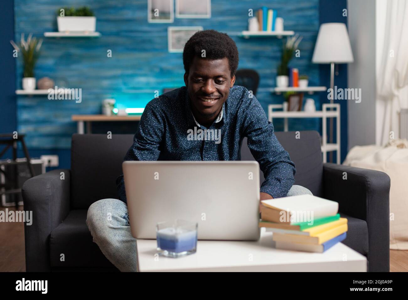 Black man studying in room hi-res stock photography and images - Alamy