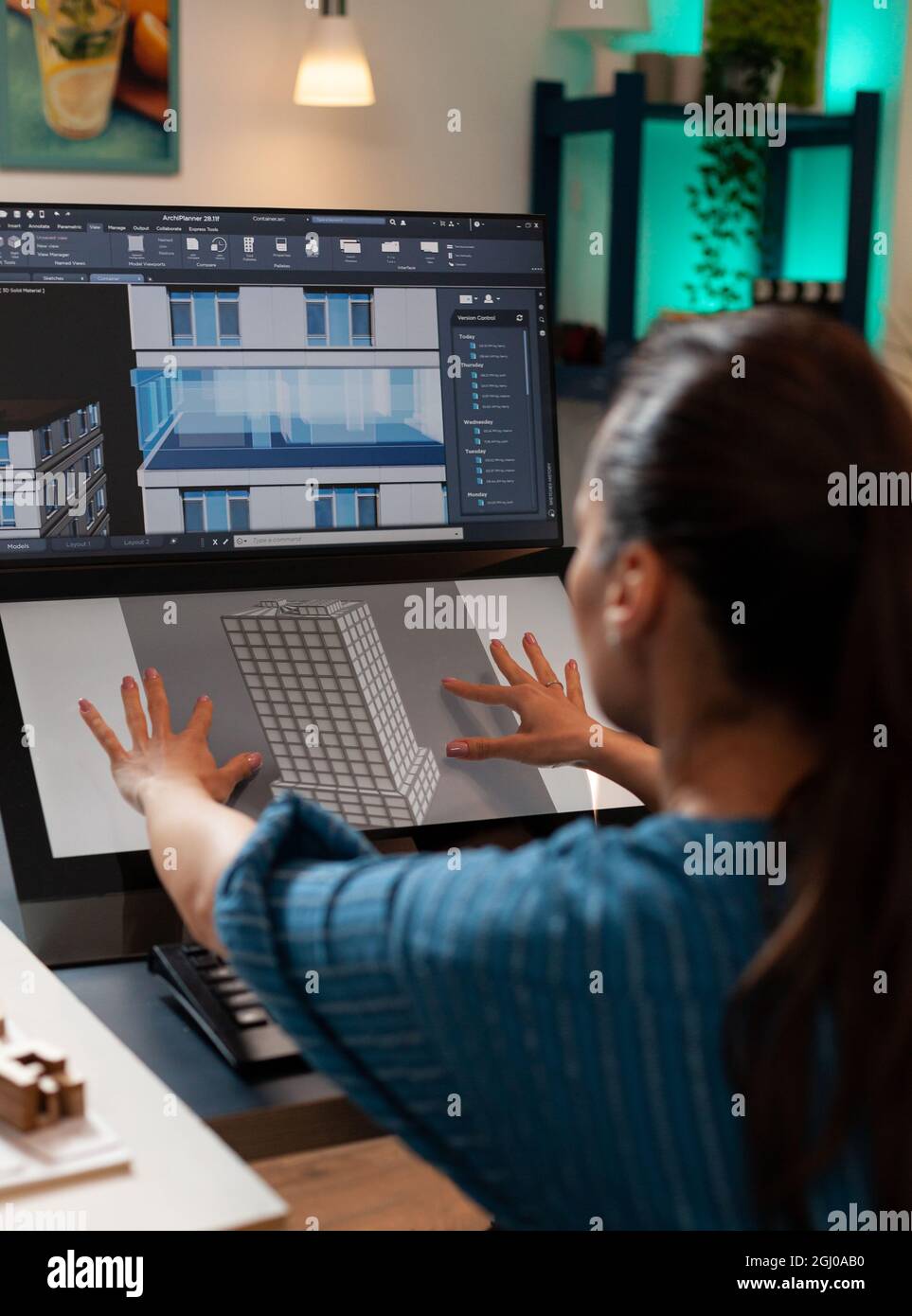 Modern architect designing building model sketch blueprint plan for ...