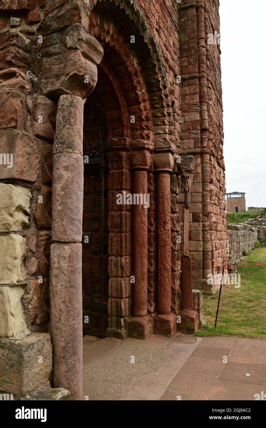 An external view of the ruins of a medieval priory building on the ...