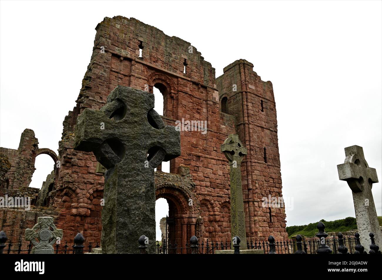 An external view of the ruins of a medieval priory building on the ...