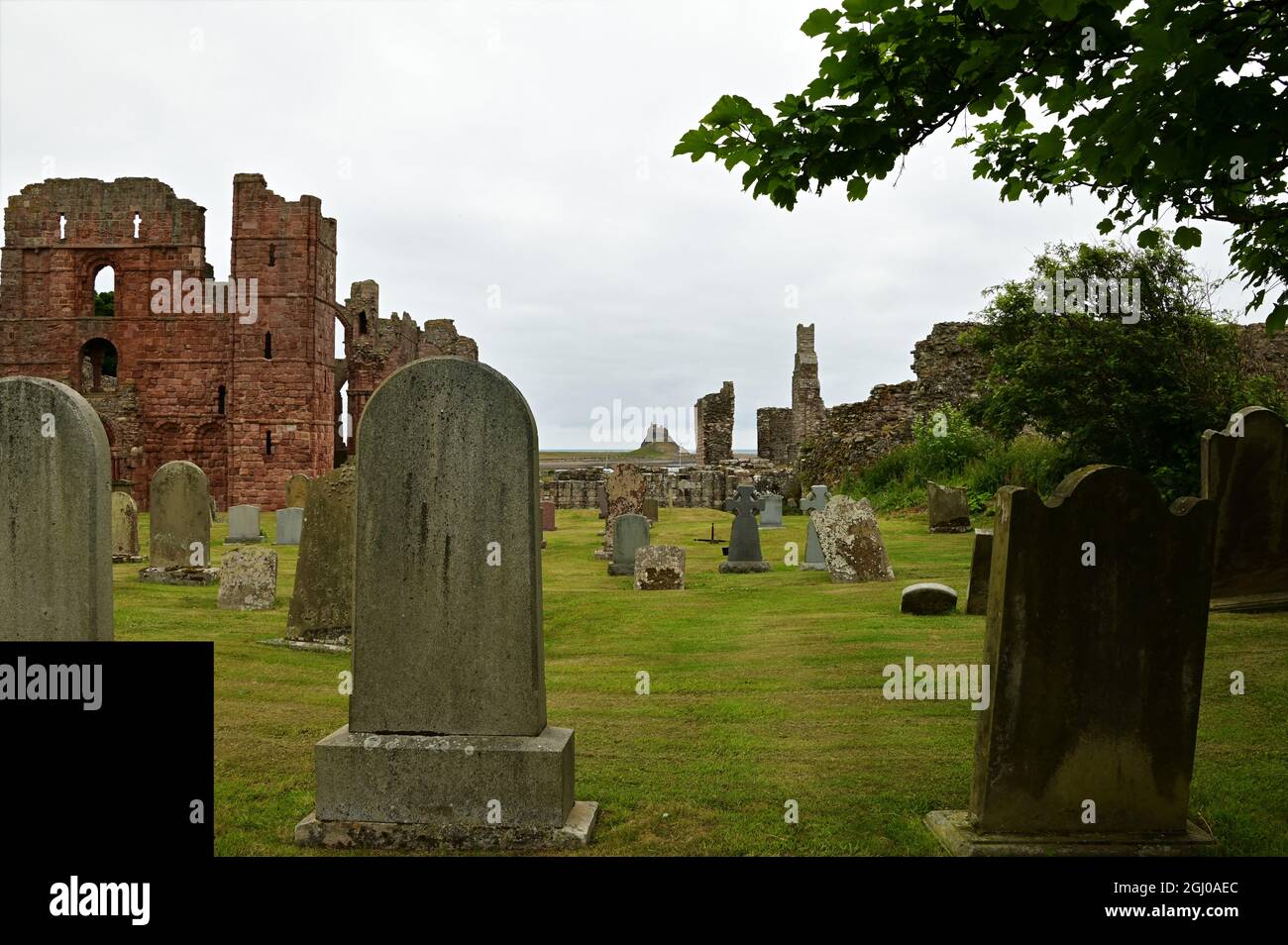 An external view of the ruins of a medieval priory building on the ...