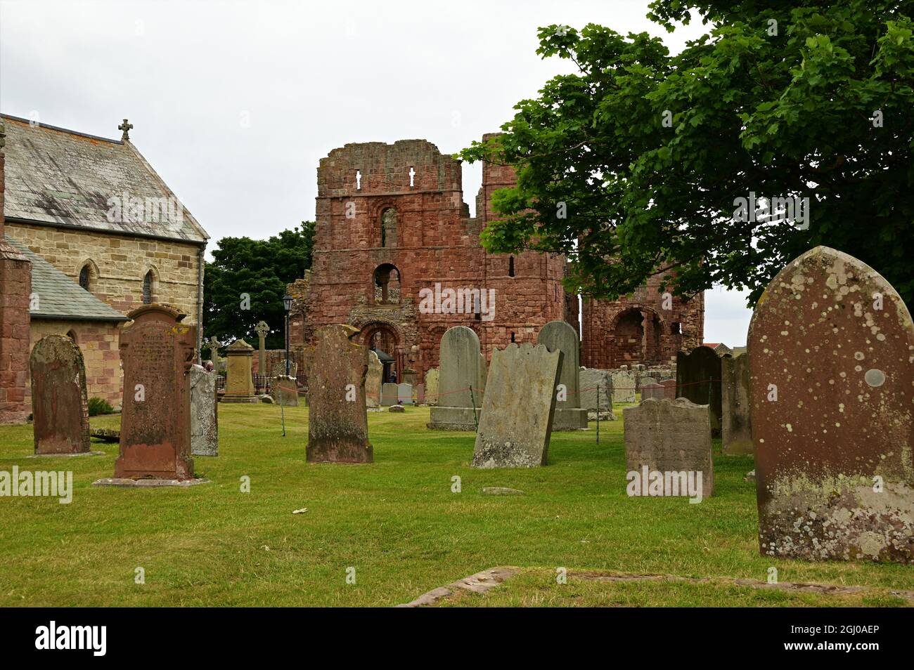 An external view of the ruins of a medieval priory building on the ...