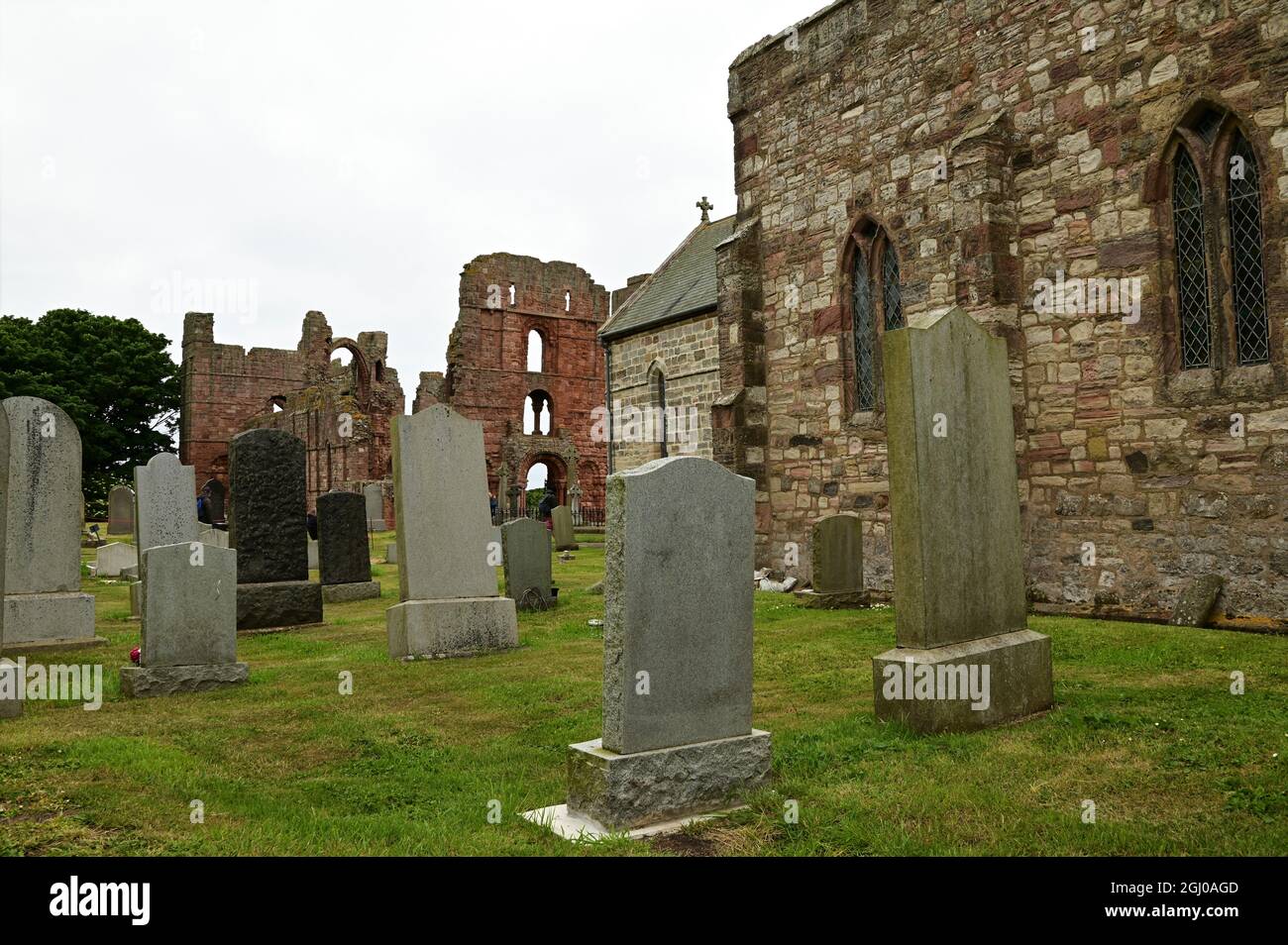 An external view of the ruins of a medieval priory building on the ...