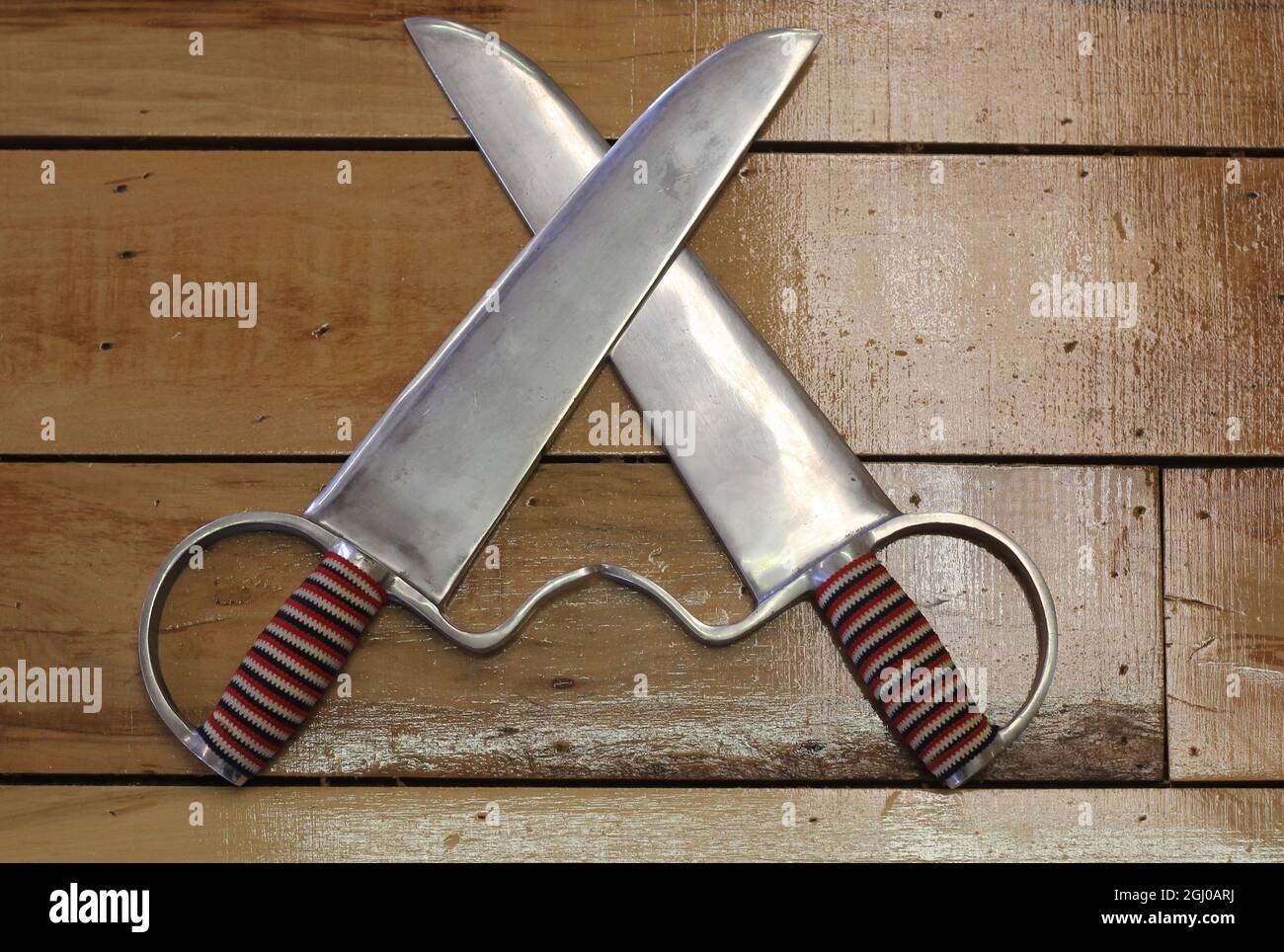 Wing Chun Butterfly Swords on Wall, Shallow DOF, Focus on Handle Stock ...