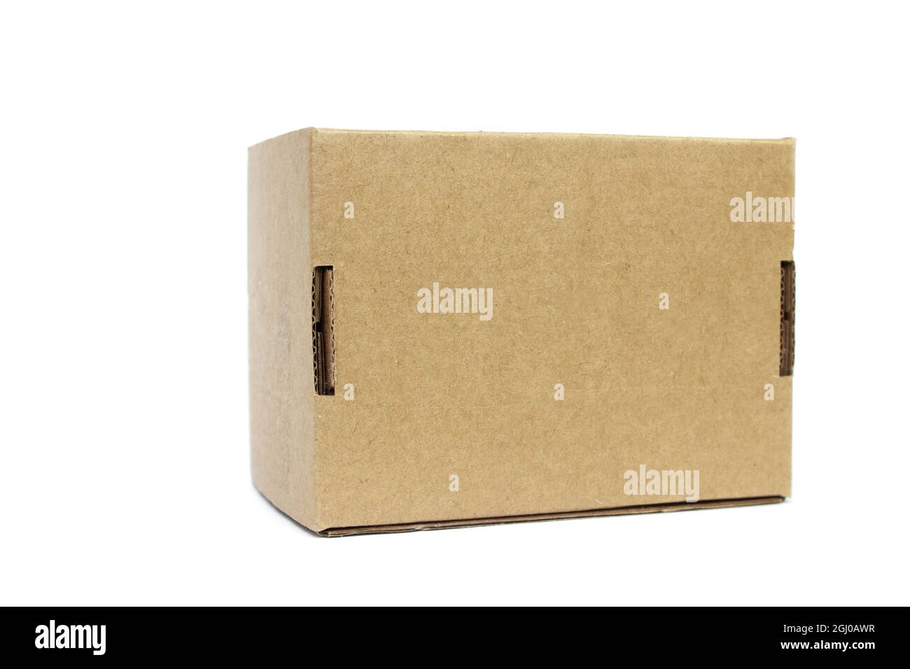 Closed brown craft box on white isolated background Stock Photo - Alamy