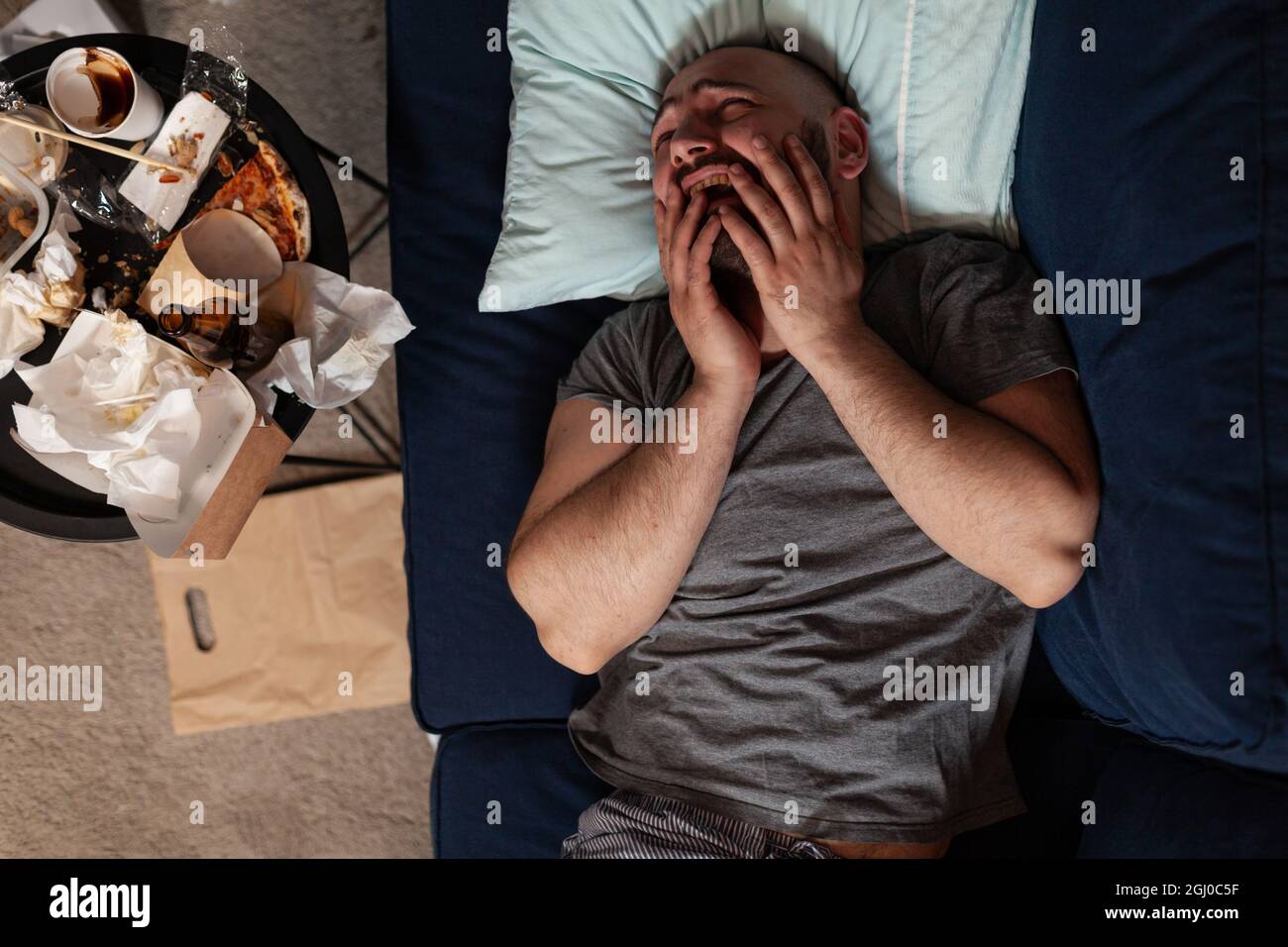 Scared, traumatized, vulnerable, shocked man unwilling to stop crying ...