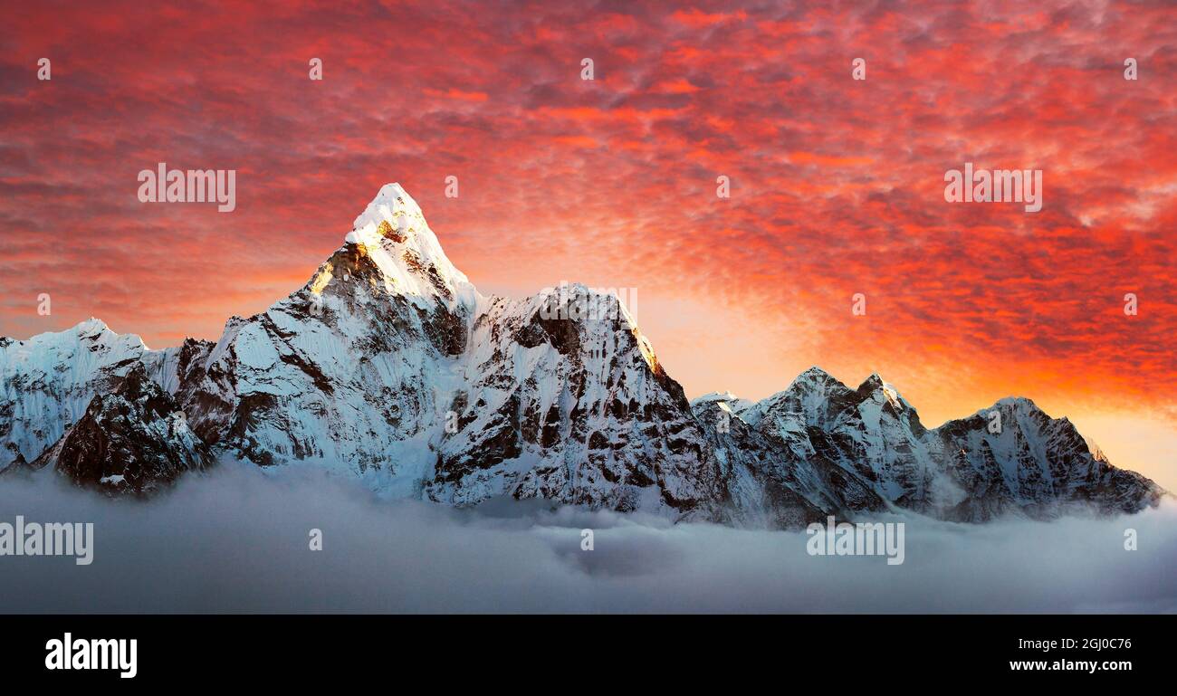 Evening panoramic sunset view of Ama Dablam with beautiful clouds on ...