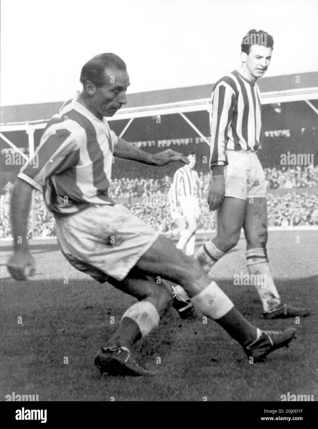 English soccer star, Stanley Matthews (L) in action when he played his ...