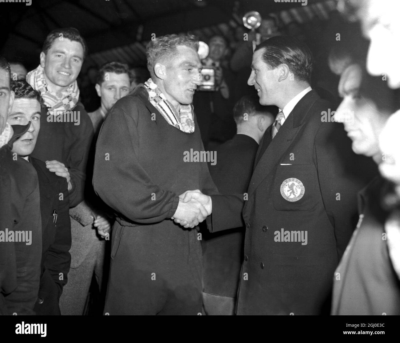 Chelsea manager Ted Drake shakes hands with the captain Roy Bentley ...