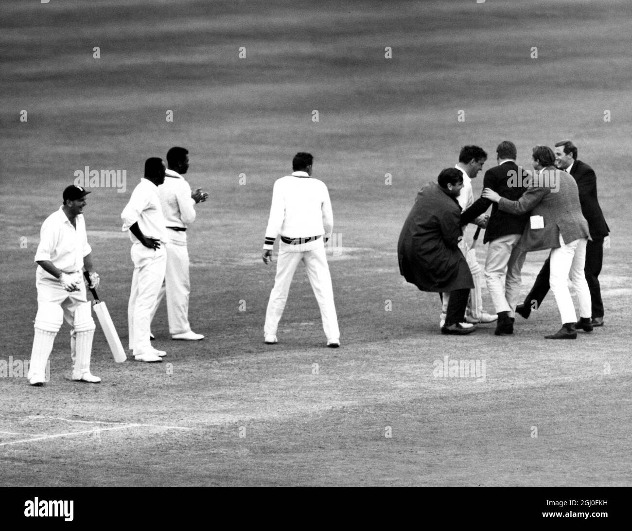 England v West Indies English supporters rush onto the pitch to ...