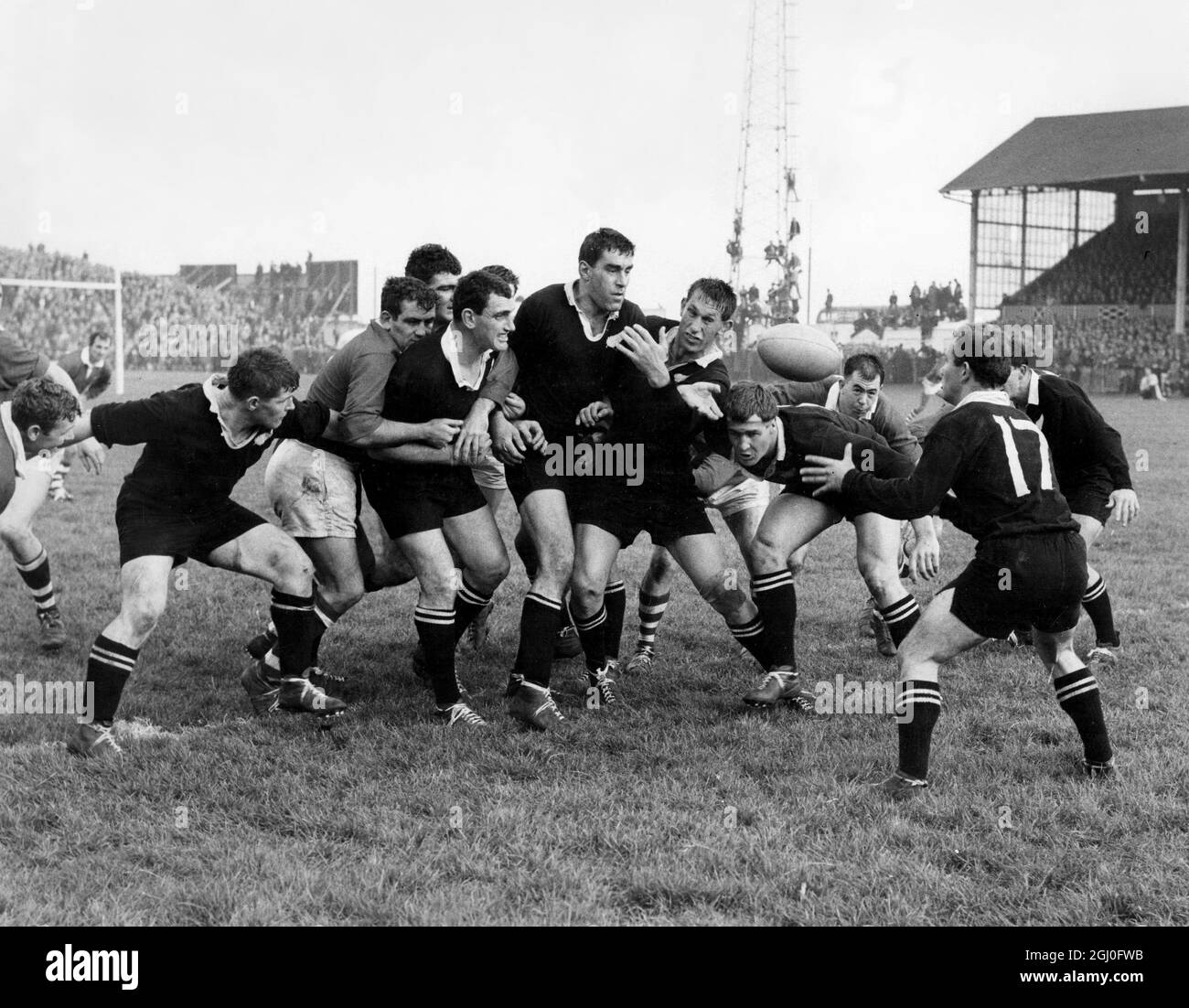 West Wales XV v New Zealand Colin Meads (centre) is well covered by the ...