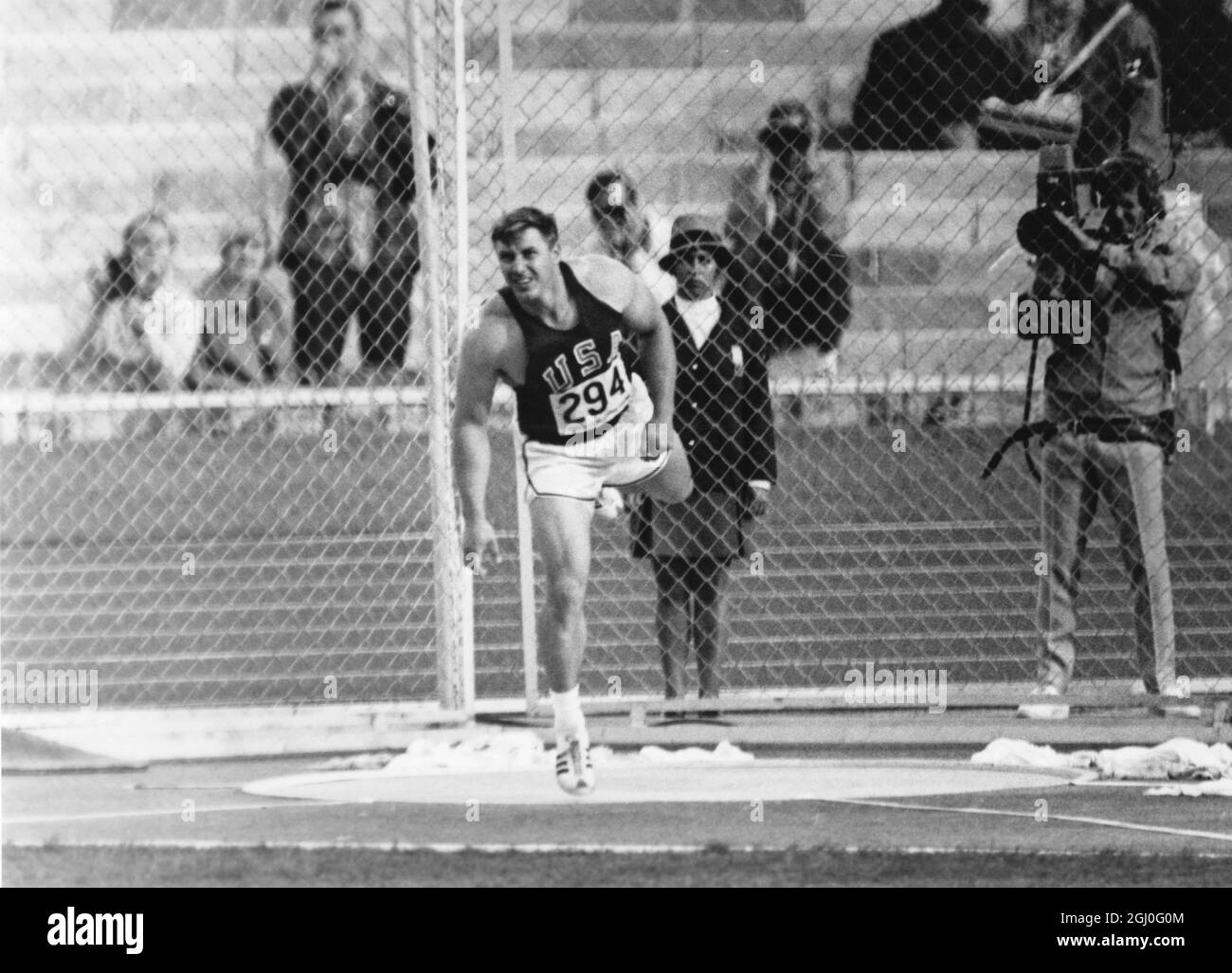 Al Oerter of the United States in action during the Men's Discus at the ...
