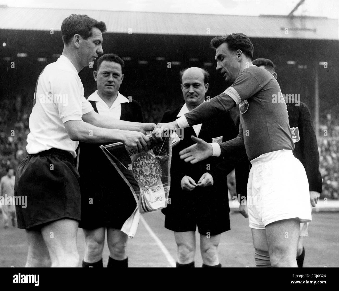 England v Austria Johnny Haynes (left), captain of England, swaps ...
