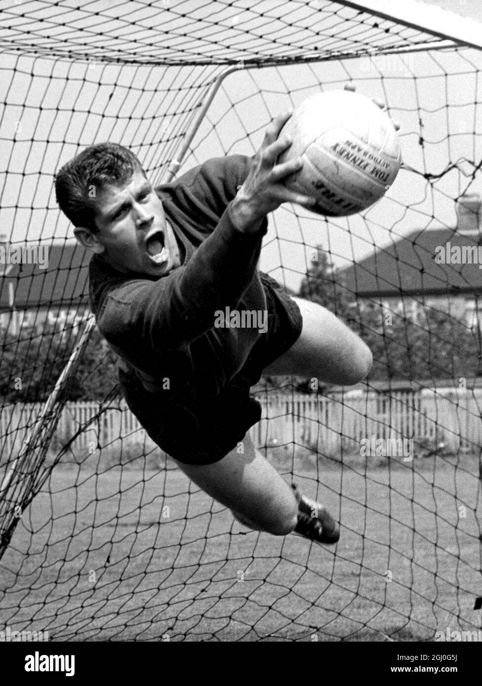 West Ham goalkeeper, Laurie Leslie, makes a save during a practice ...