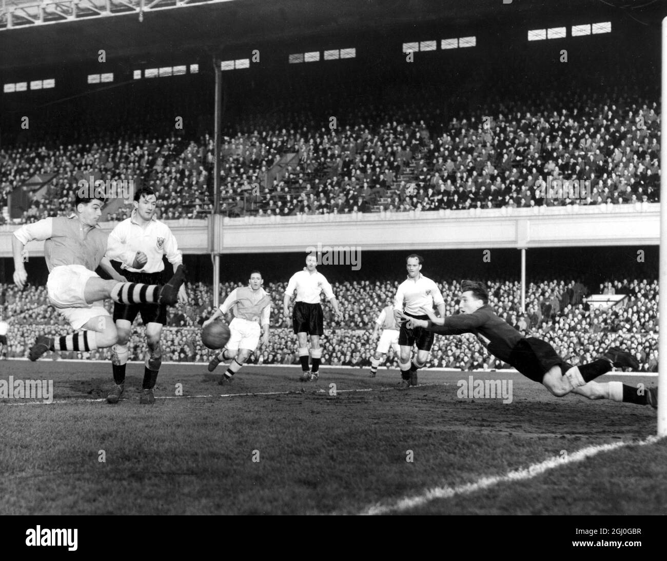 Arsenal v Blackpool An all action shot as Cliff Holton, the Arsenal ...