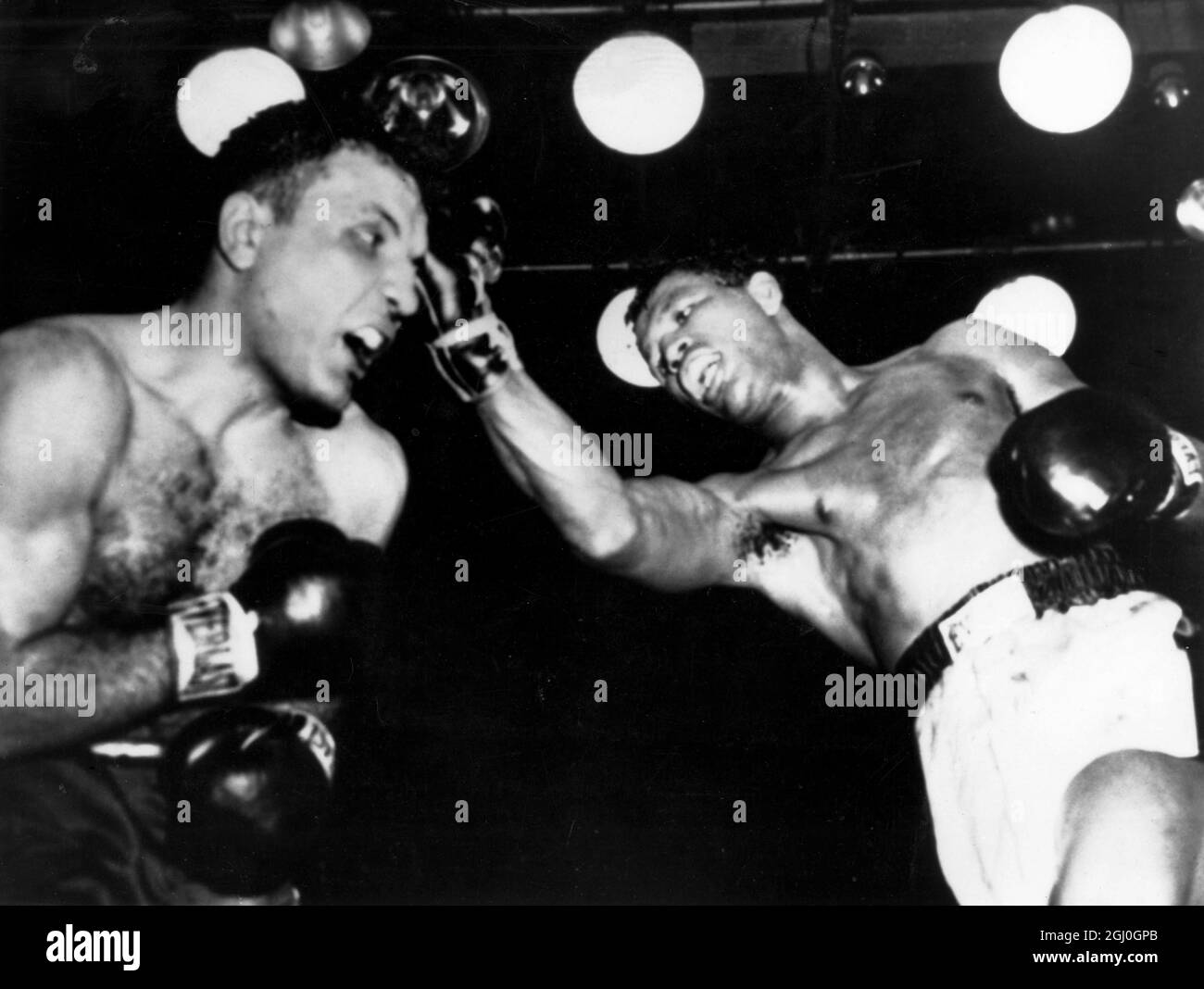 Sugar Ray Robinson cuts loose in the thirteenth round of his fight with ...