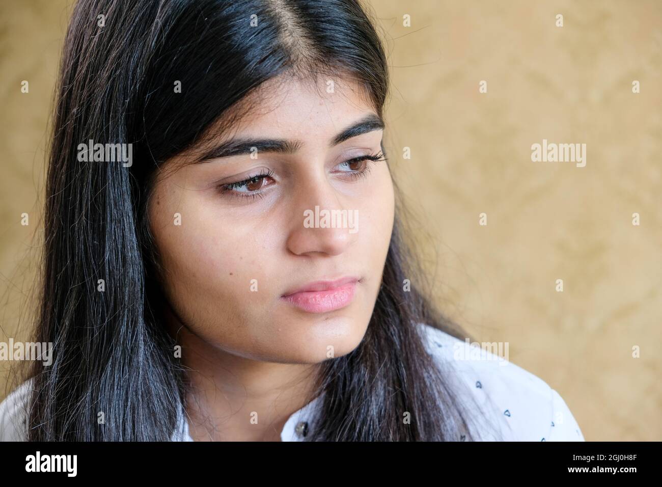 Beautiful young Indian girl at home Stock Photo - Alamy