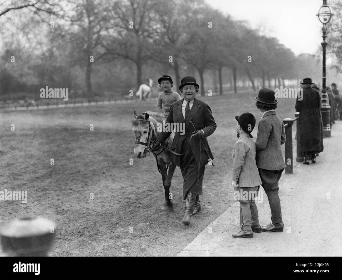 Boy horse riding lesson hi-res stock photography and images - Alamy