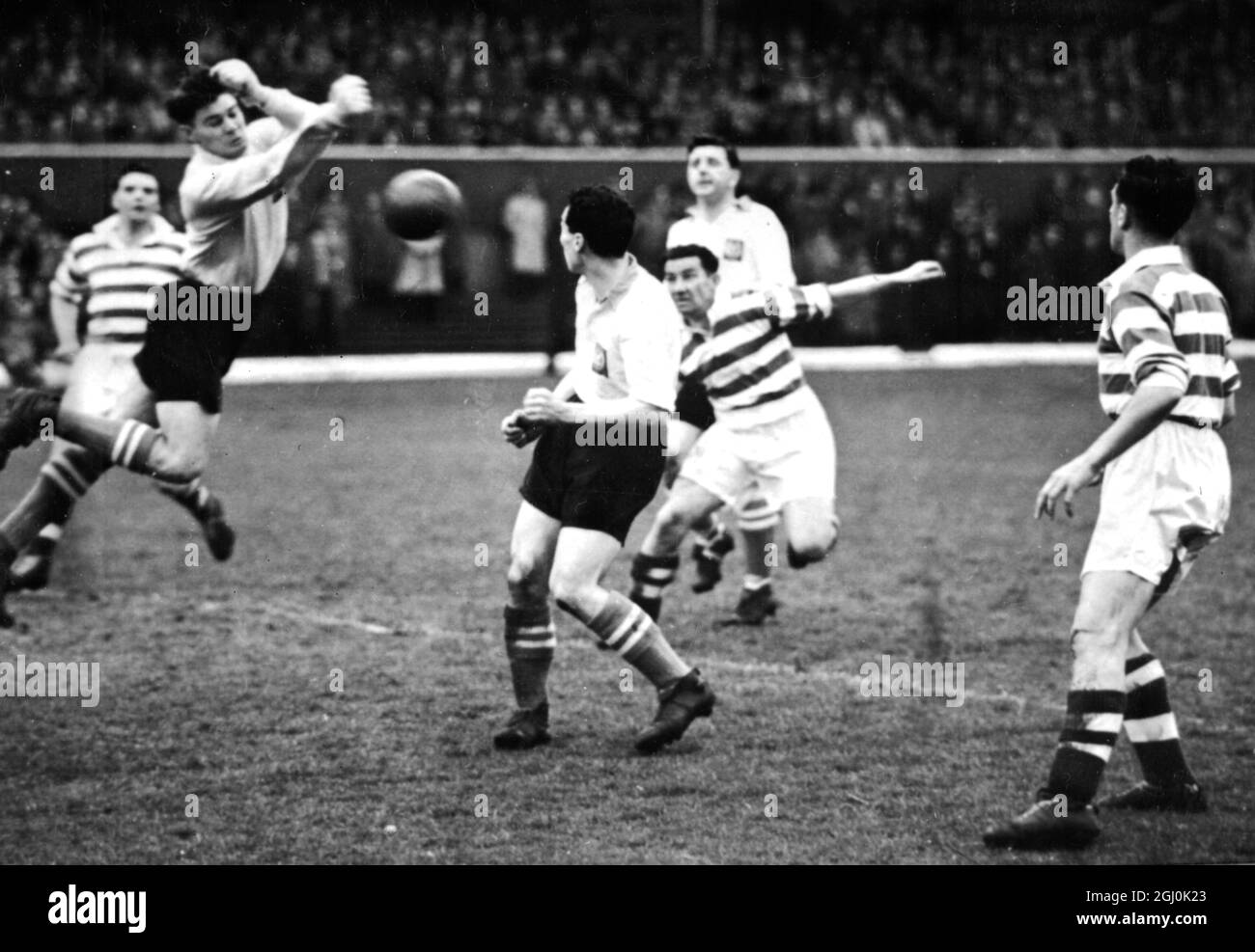 Glasgow, Scotland: Clyde goalkeeper Hewkins breaks up a Celtic attack ...