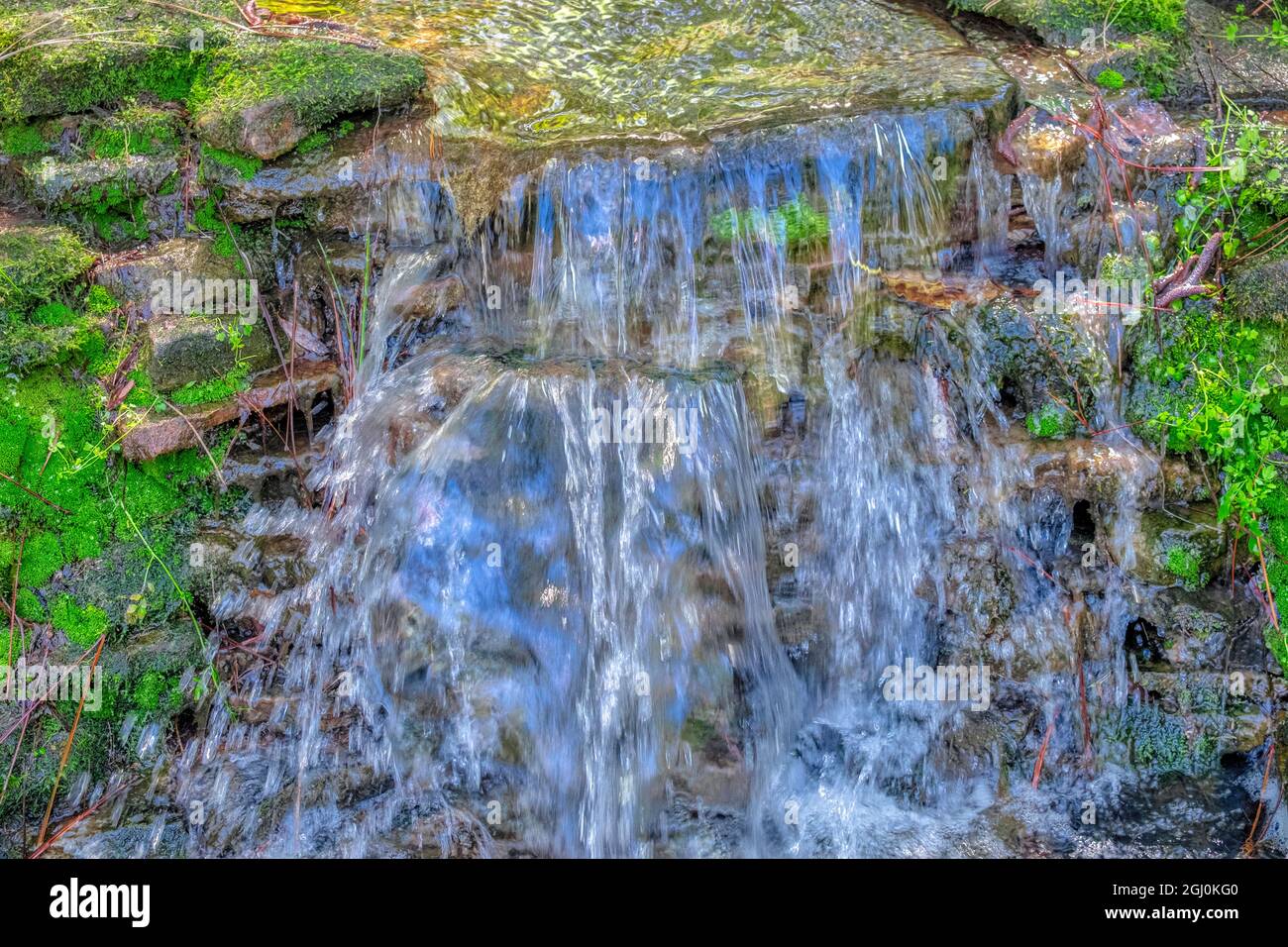 Waterfall on a creek Stock Photo - Alamy