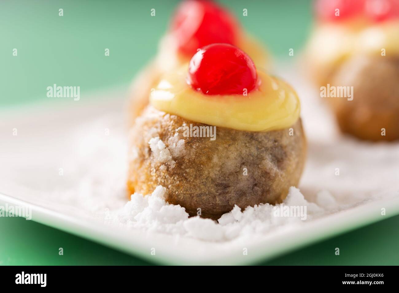 Traditional Italian Zeppole pastry on green background Stock Photo - Alamy