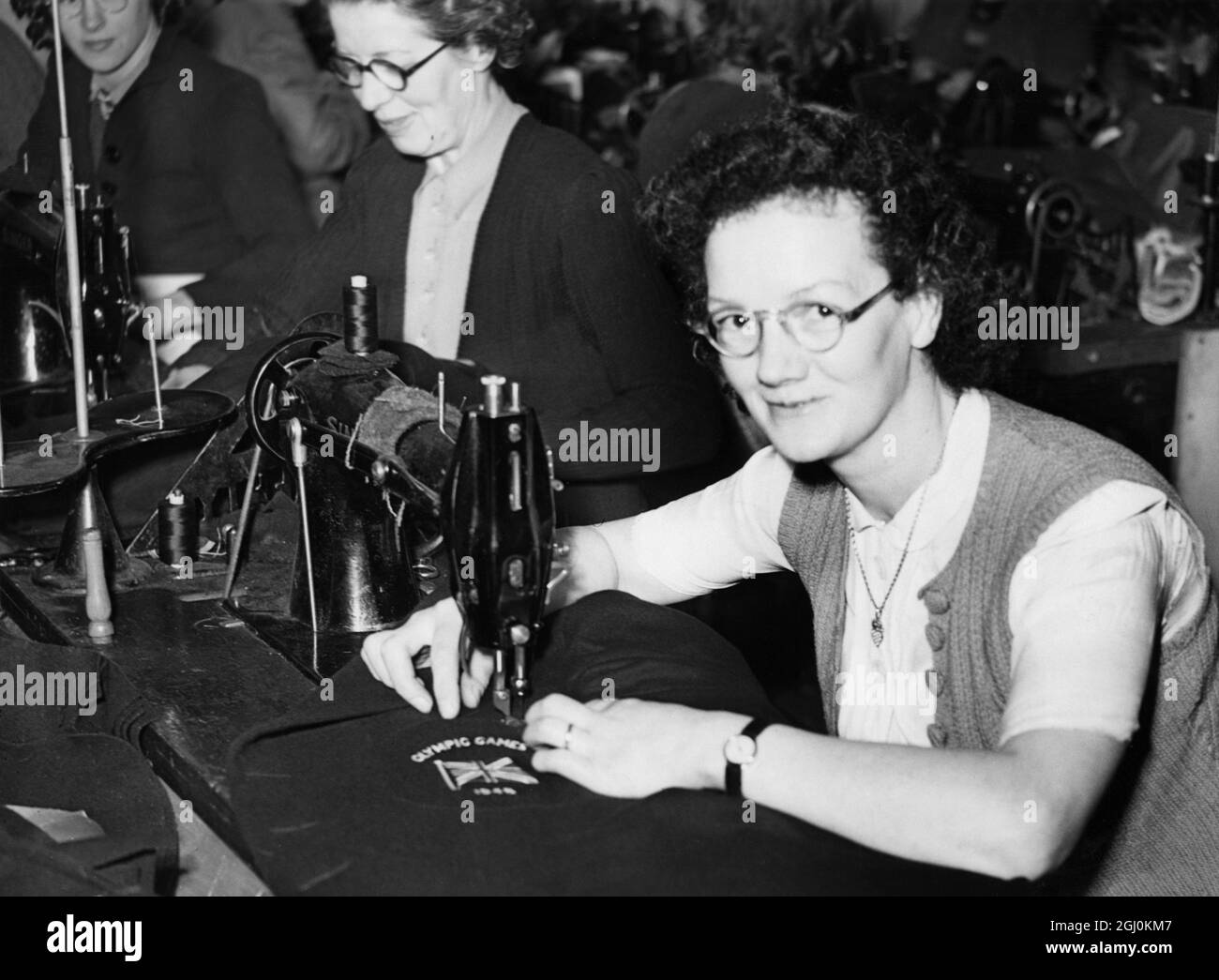 West London clothing factory girls making suits for the British Olympic ...
