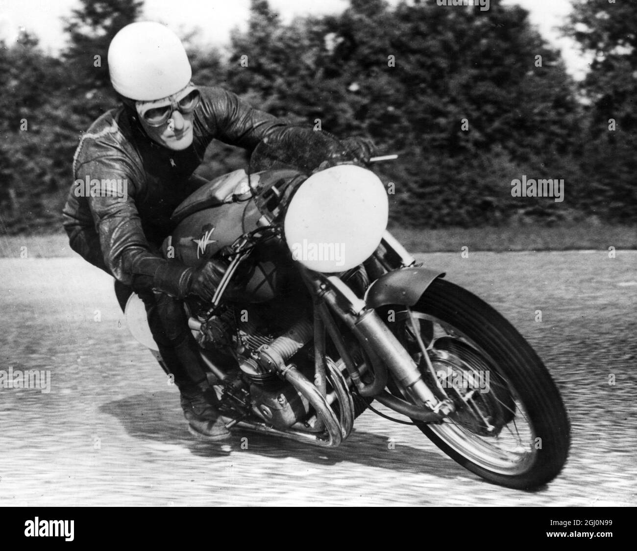 Britain's Leslie Graham at speed on his MV Agusta at Monza , Italy - as ...