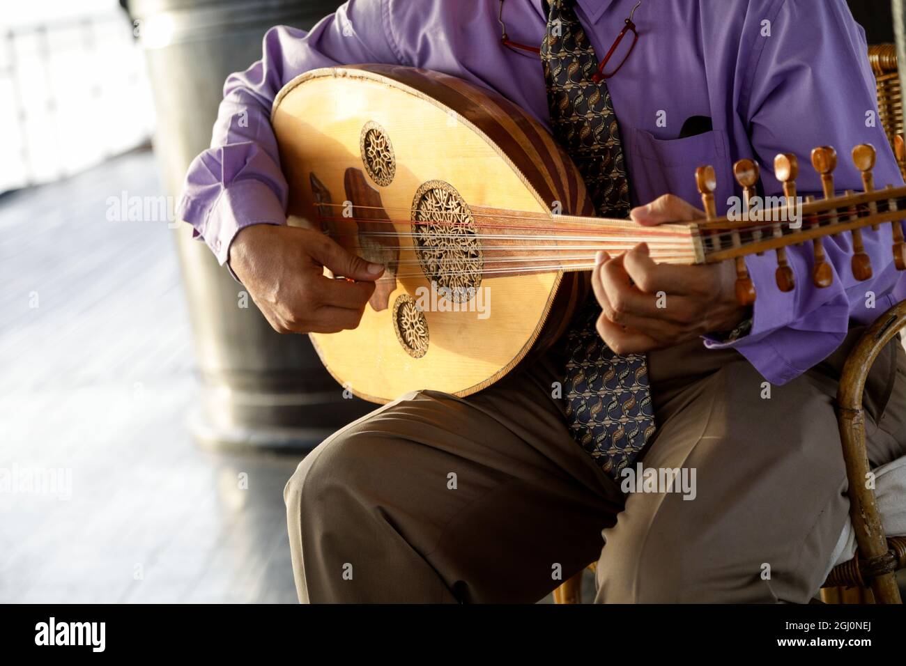 Man playing traditional Egyptian instrument. En Route to Luxor on the ...