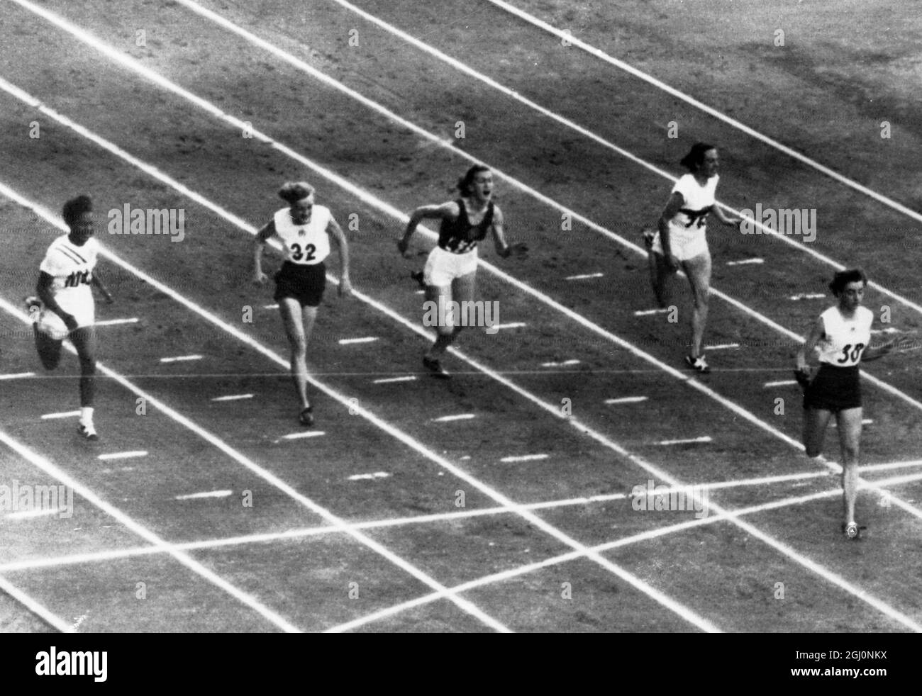 Australia ' s Marjorie Jackson winning heat one of the semi-final of ...